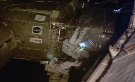 NASA astronauts install high-def cameras during spacewalk